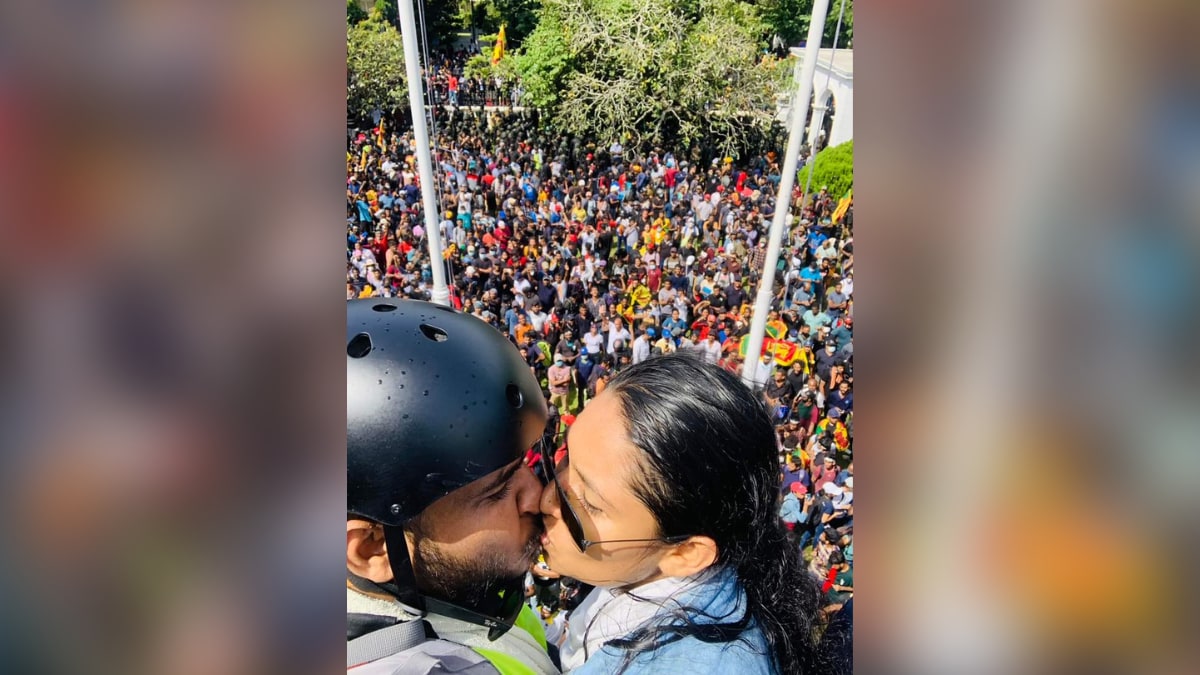 Couple kiss photo goes viral amid protest is Sri Lanka